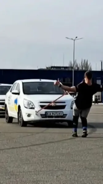 Ukrainian Man Breaks World Record After Pulling 6 Cars with Teeth ... Ukrainian Man Breaks World Record After Pulling 6 Cars with Teeth ...