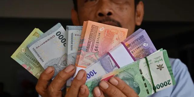 Jadwal Penukaran Uang Baru BI 2025 - merdeka.com
