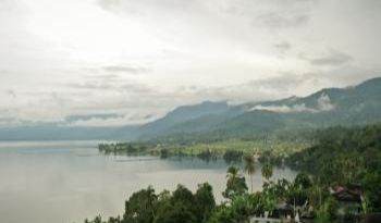 Mengunjungi Danau Maninjau, Keindahan Alam Sumatra Barat yang Wajib ...