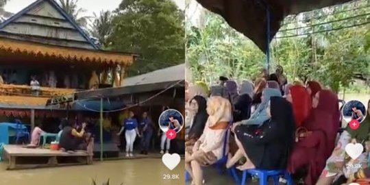 Viral Pernikahan di Tengah Banjir, Aksi Para Tamunya Curi Perhatian | merdeka.com
