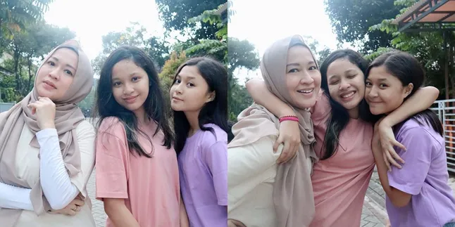 Portrait of Okie Agustina with her two daughters, Like Playmates ...